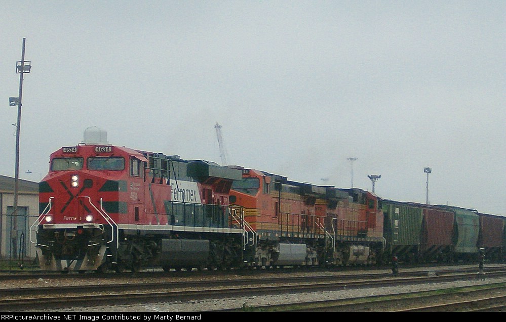 FXE 4634, a GE, Leads Two BNSF Sisters on CSX
